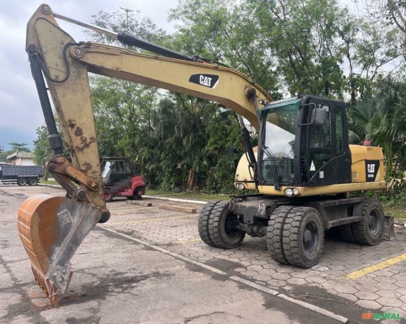 Escavadeira de Rodas Caterpillar Modelo M315d2 Ano 2014, de 722732